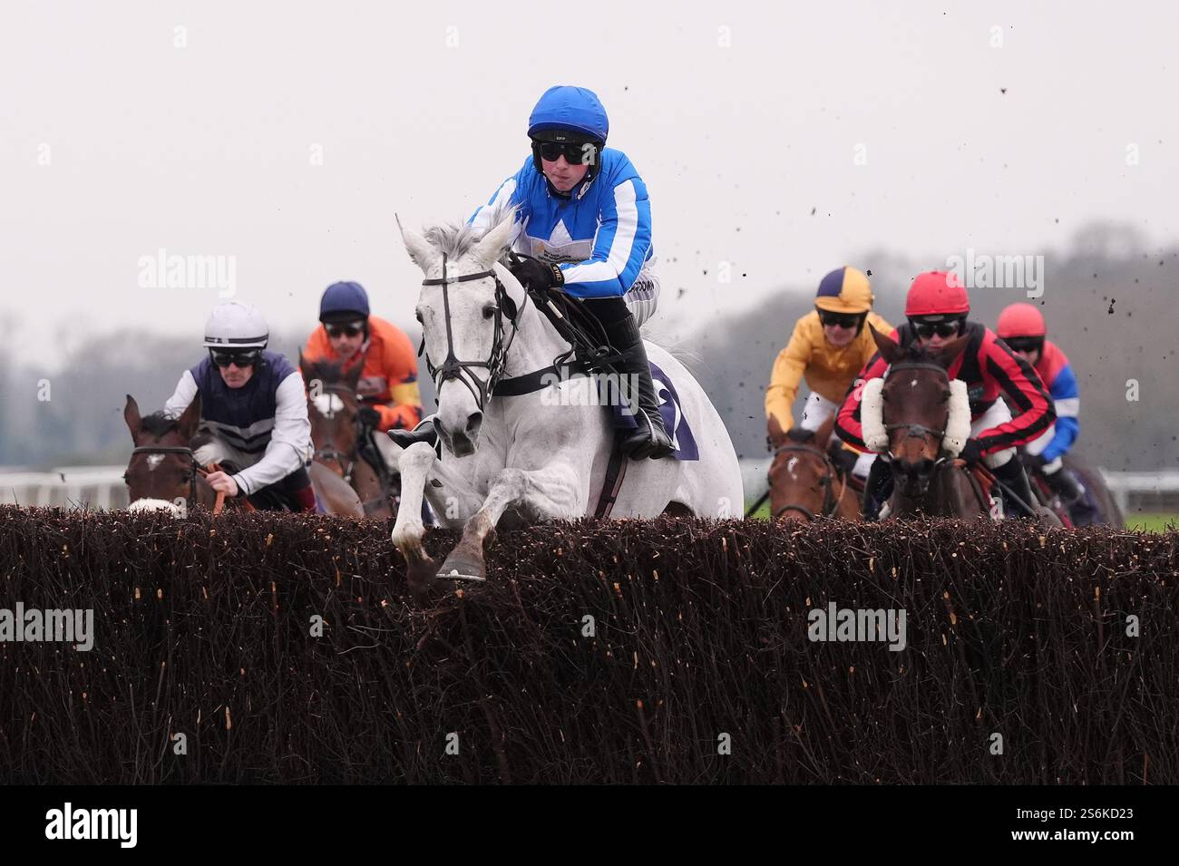 Sacre Coeur ridden by Harry Atkins (centre) competes in the Lets Bet ...