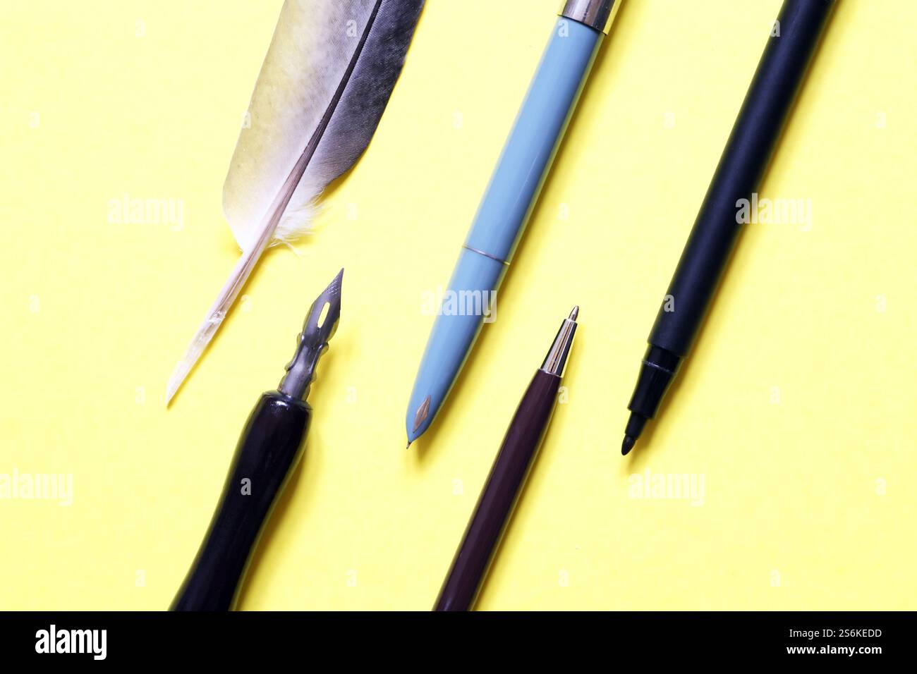 The development of the fountain pen. Set of various pens closeup on ...