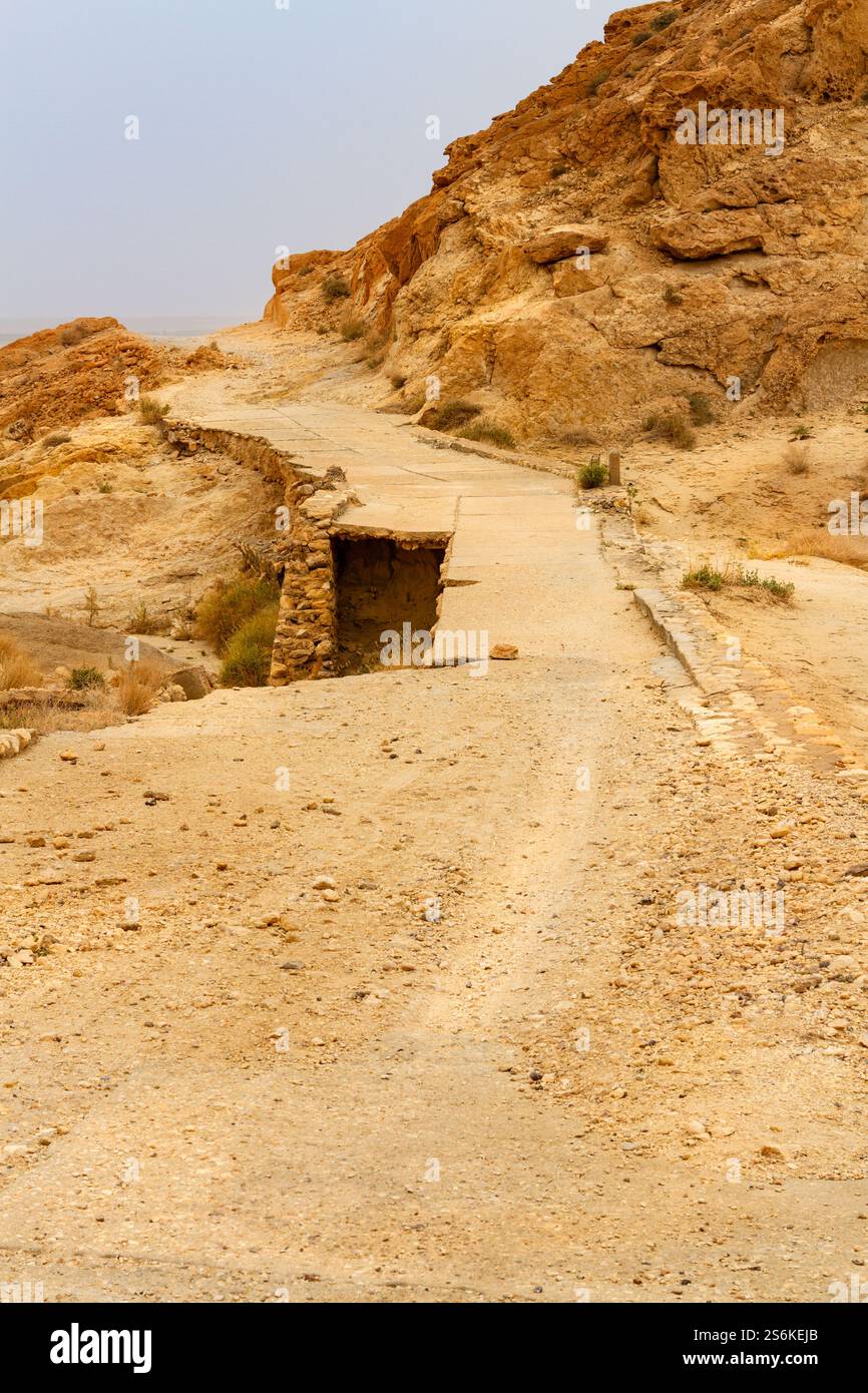 Concrete dilapidated road built by German troops during World War II ...
