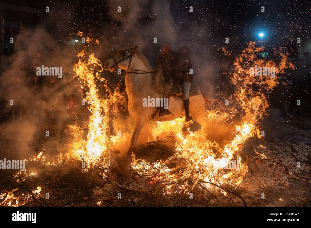 San Bartolome De Pinares, Spain. 16th Jan, 2025. A horse rider jumps ...