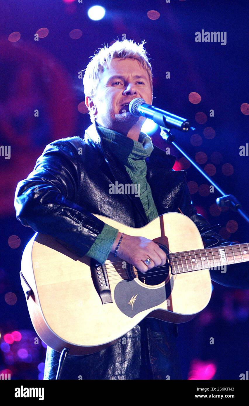 Milan Italy 07/12/2001: Ron, Italian singer, during the live concert at ...