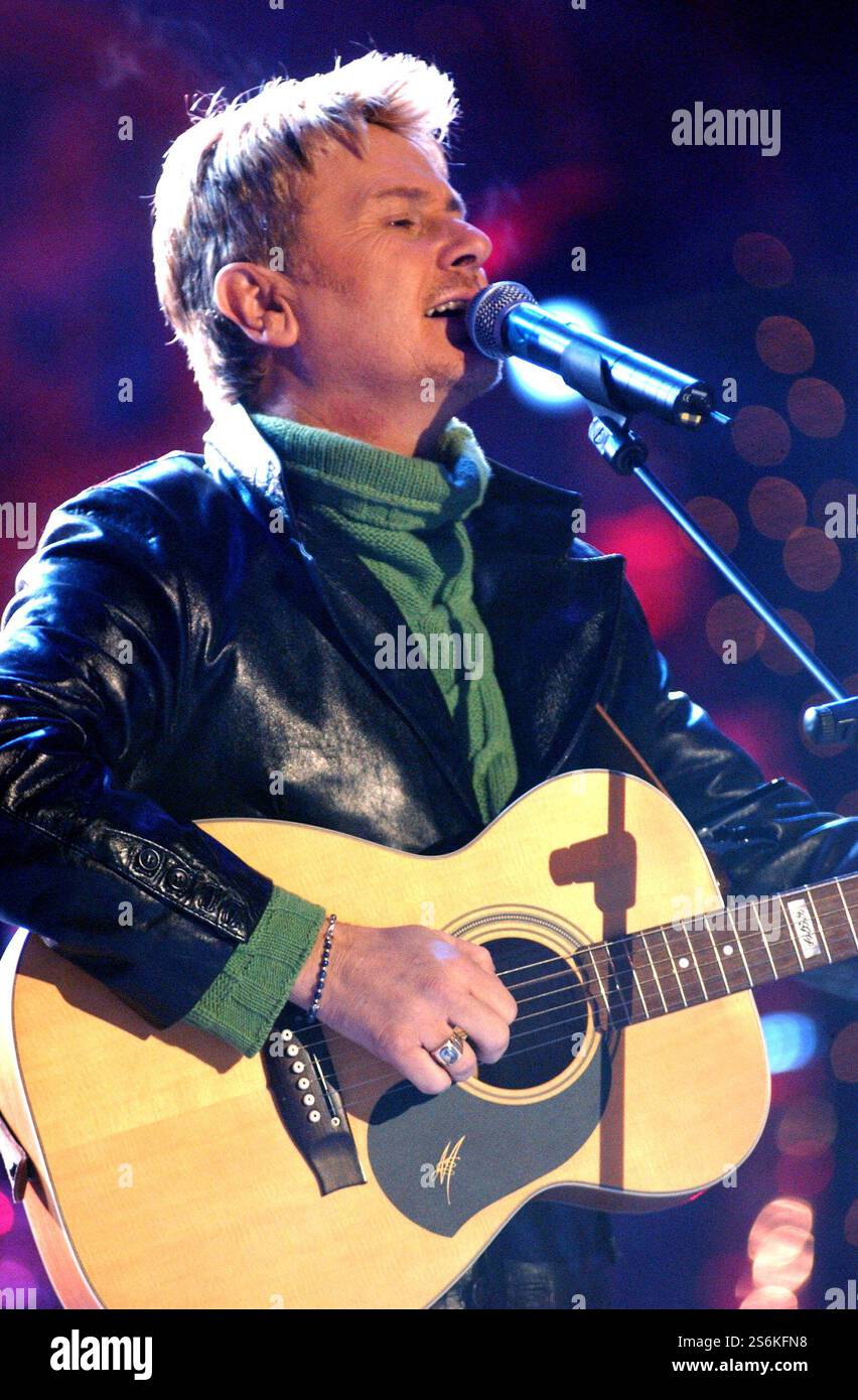Milan Italy 07/12/2001: Ron, Italian singer, during the live concert at ...