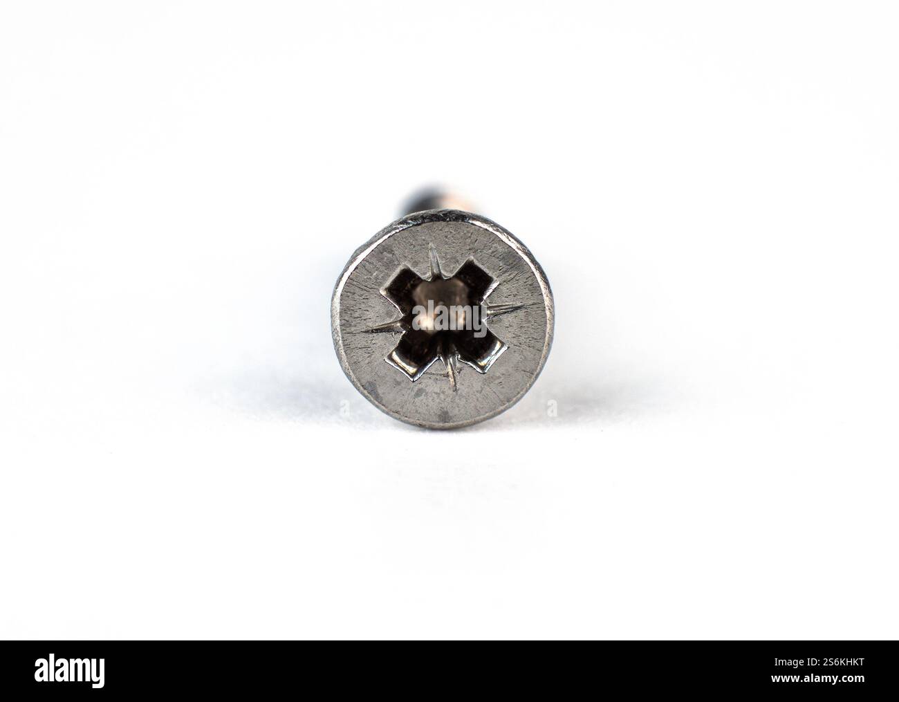 metallic screw with a unique star-shaped head detail Stock Photo - Alamy