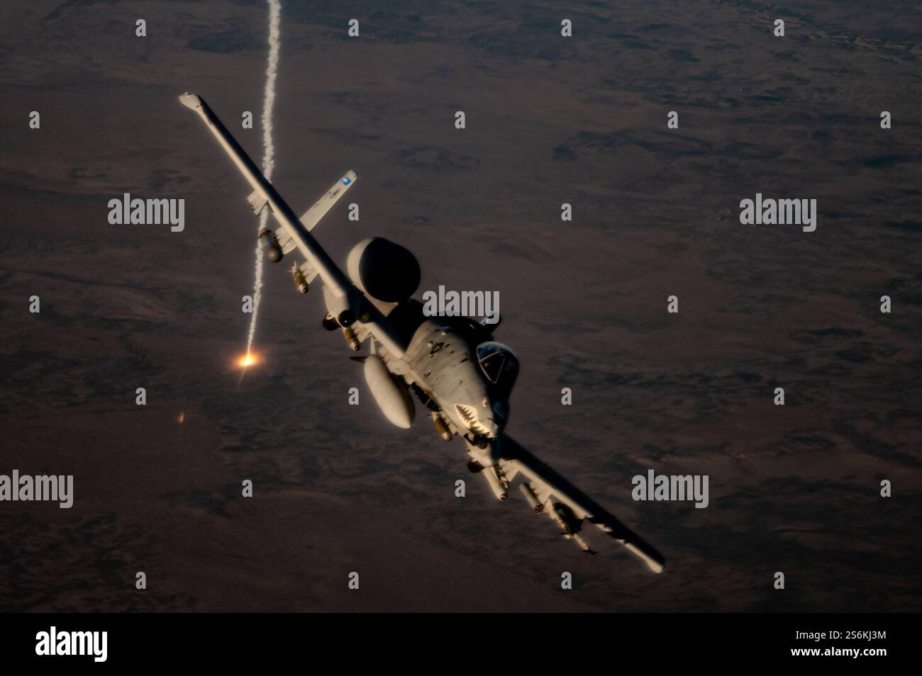 A U.S. Air Force A-10 Thunderbolt II fires flares over the U.S. Central ...
