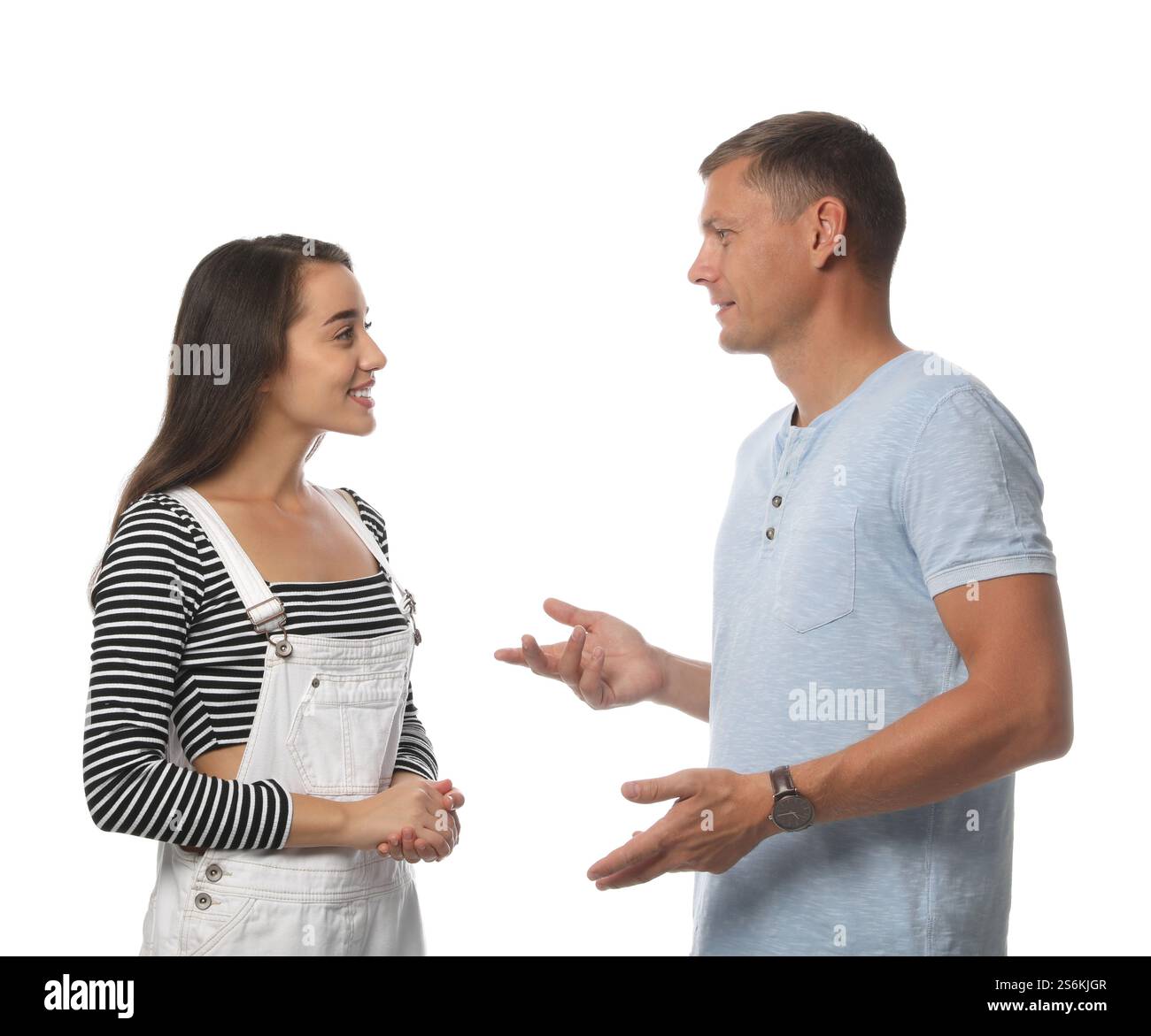 Man and woman talking on white background Stock Photo - Alamy