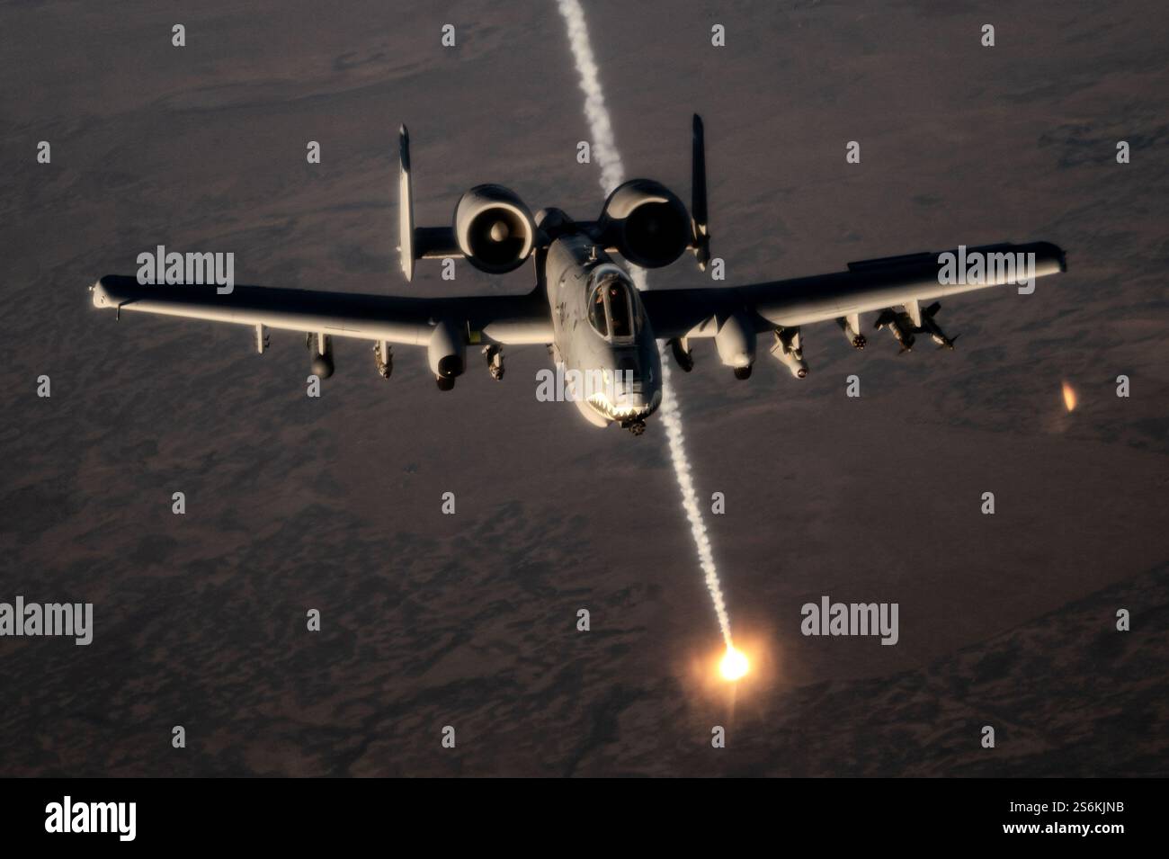 A U.S. Air Force A-10 Thunderbolt II fires flares over the U.S. Central ...