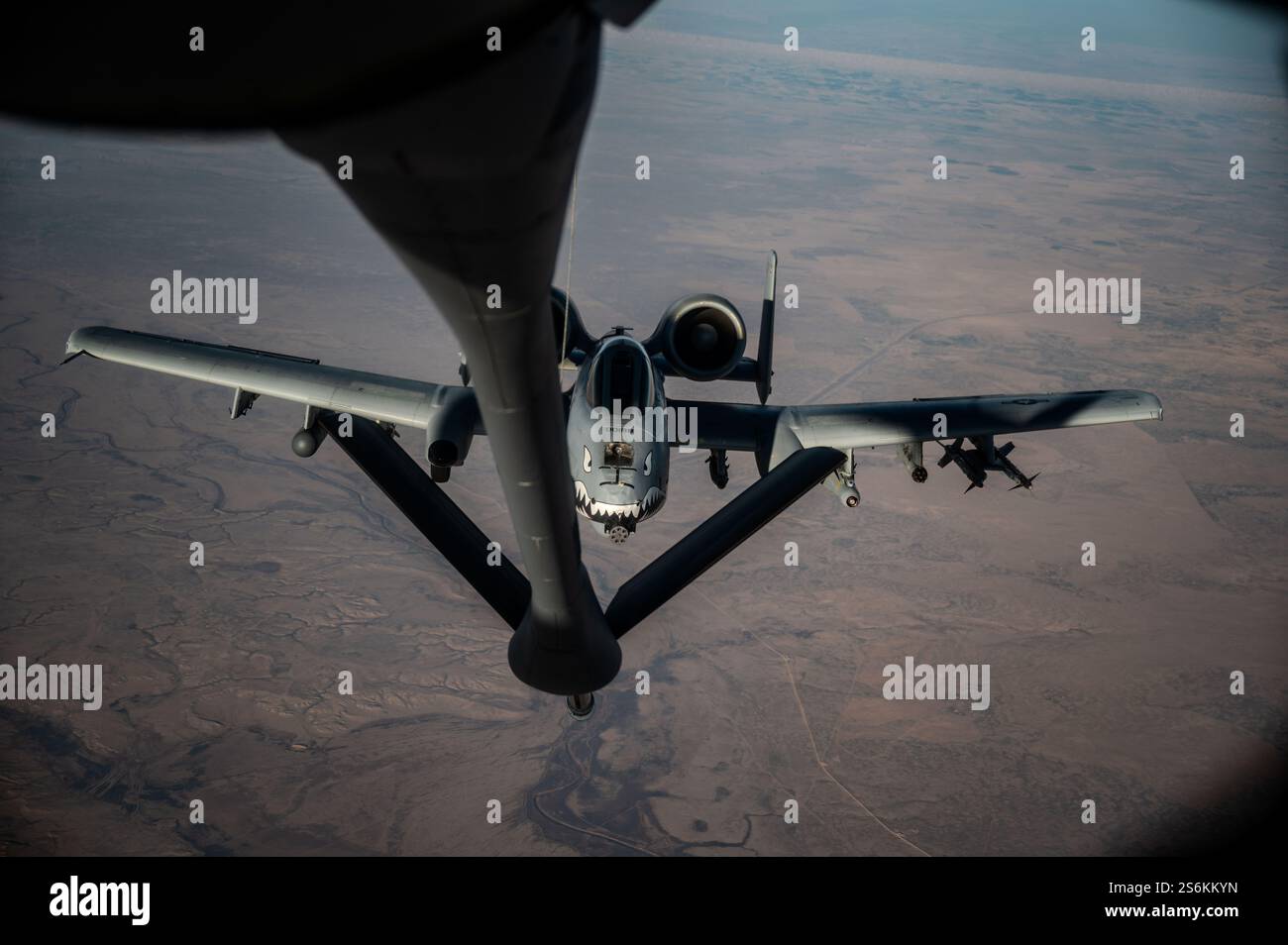A U.S. Air Force A-10 Thunderbolt II approaches a KC-135 Stratotanker for aerial refueling over ...