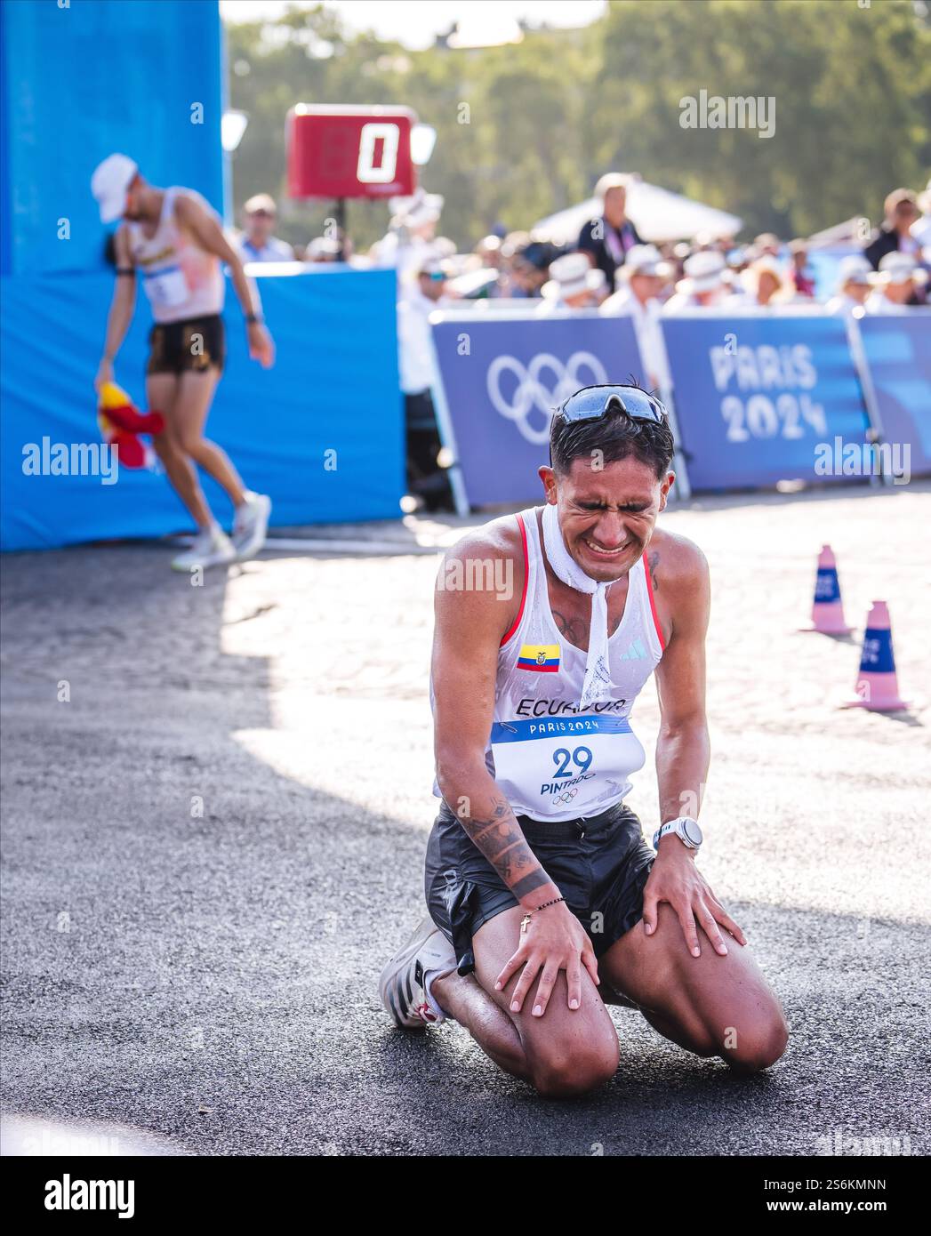 Daniel Pintado celebrating her medal with her country's flag at the ...