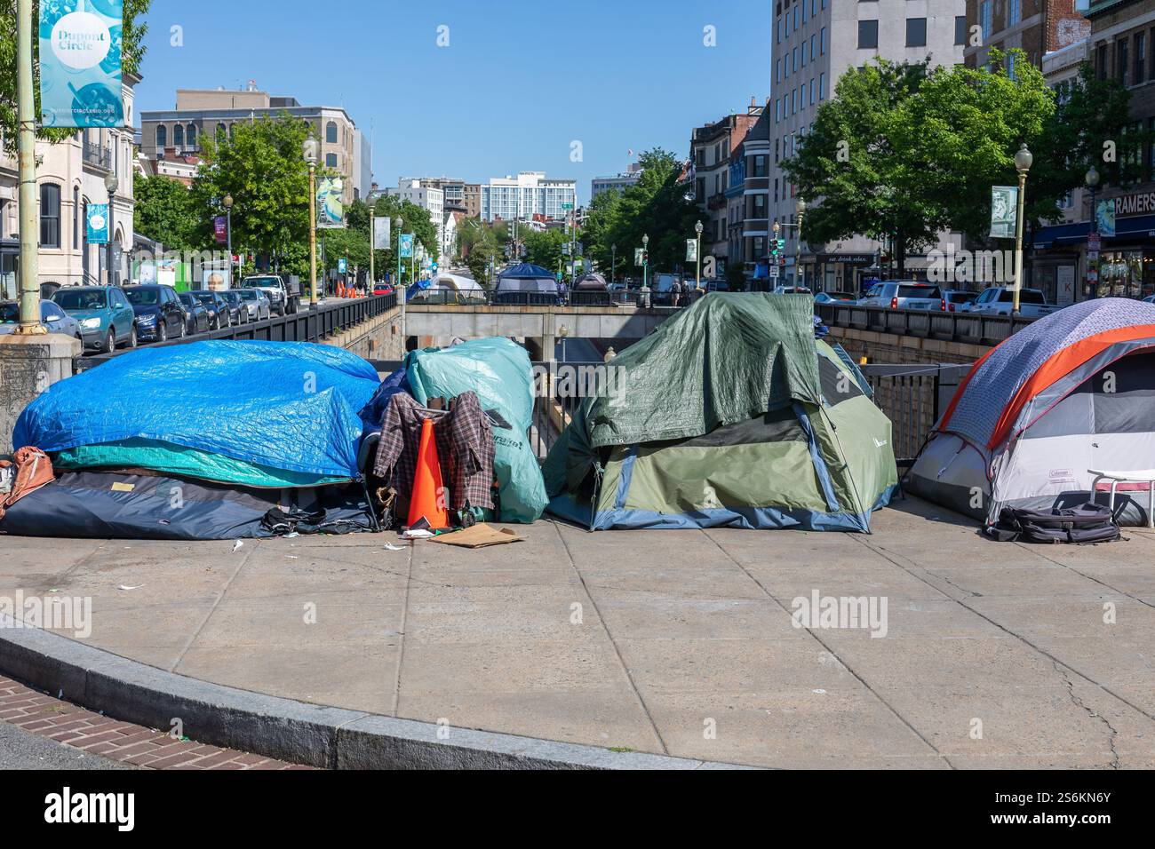 Homeless encampment on the sidewalk with tents at a row at Dupont ...