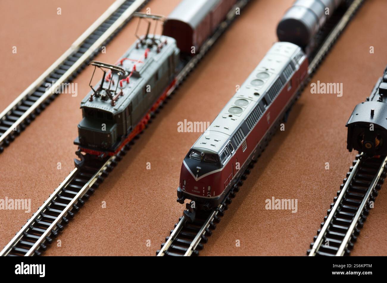 Toy passenger train and railroad with selective focus effect. Model of ...