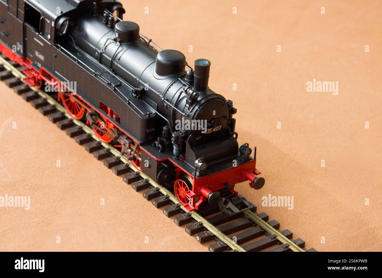 Toy locomotive and railroad with selective focus effect. Model of a ...