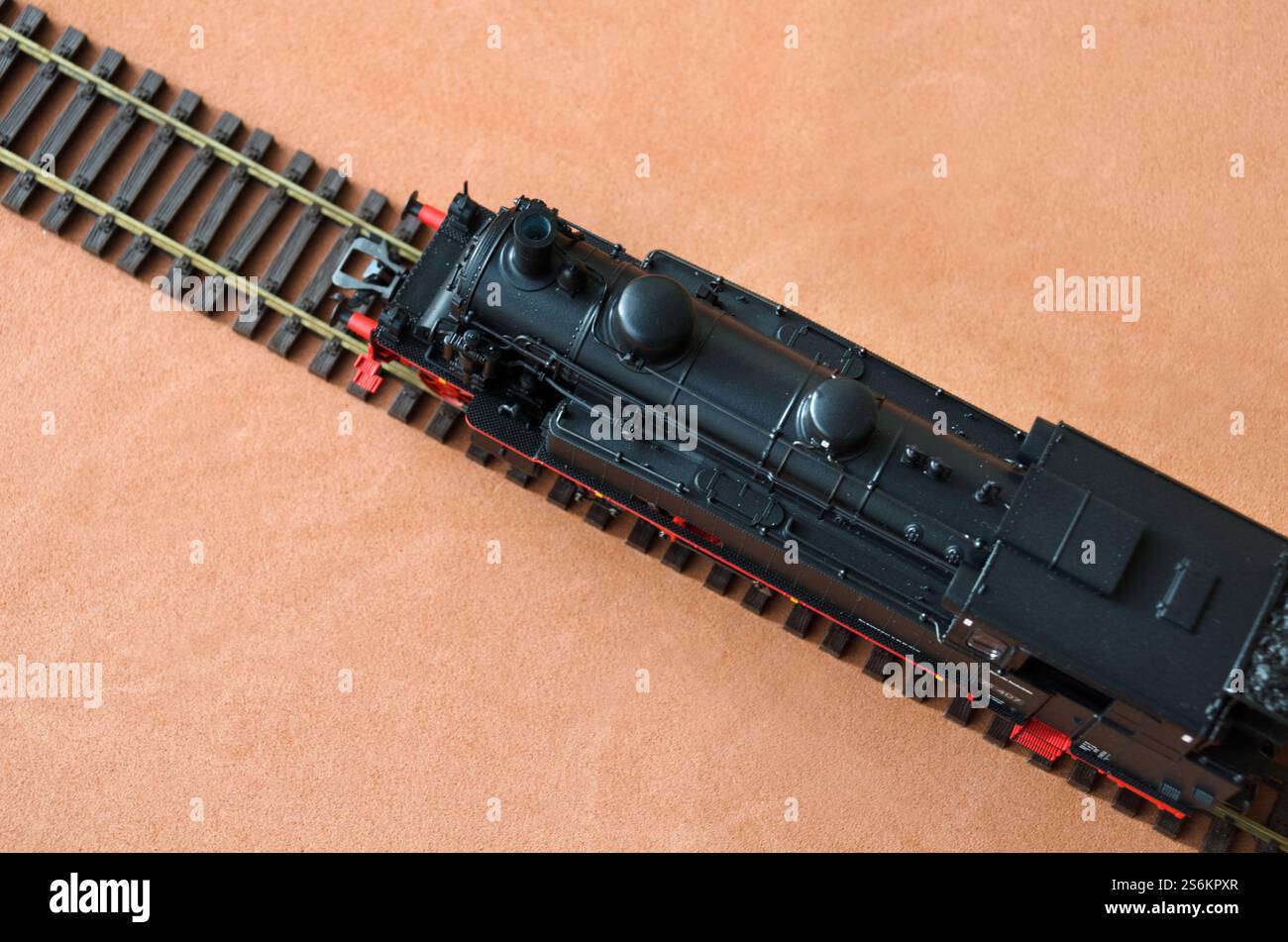 Toy locomotive and railroad with selective focus effect, top view ...