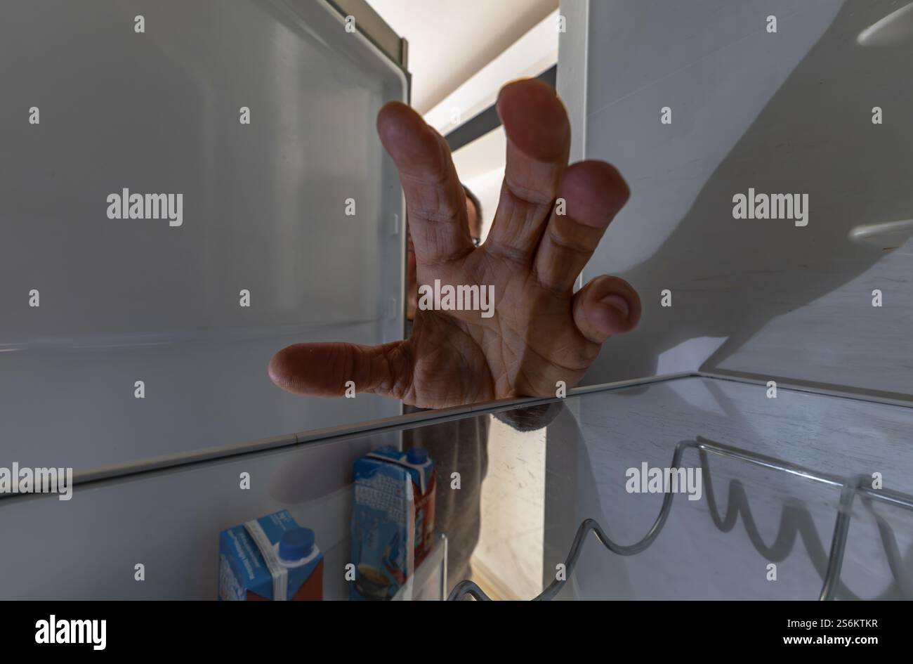Food crisis, poverty and empty fridge, human hand looking for food in ...