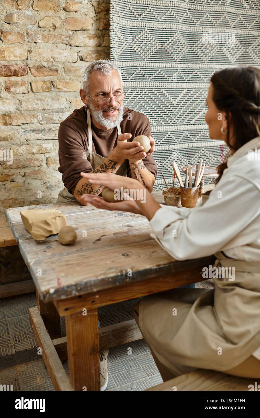 Couple shares a delightful pottery class experience, crafting clay ...