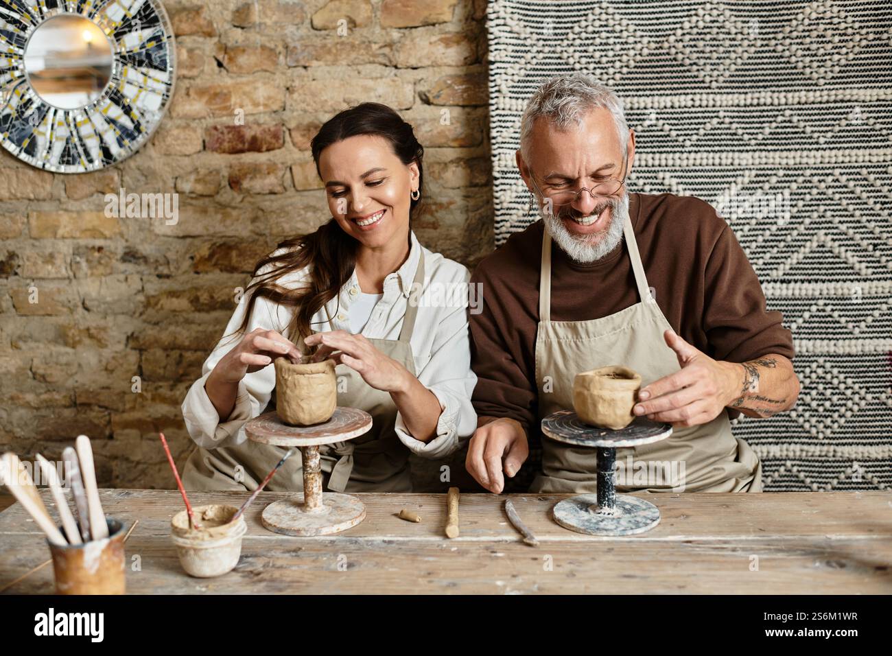 A couple shares quality time in a pottery class, embracing creativity ...