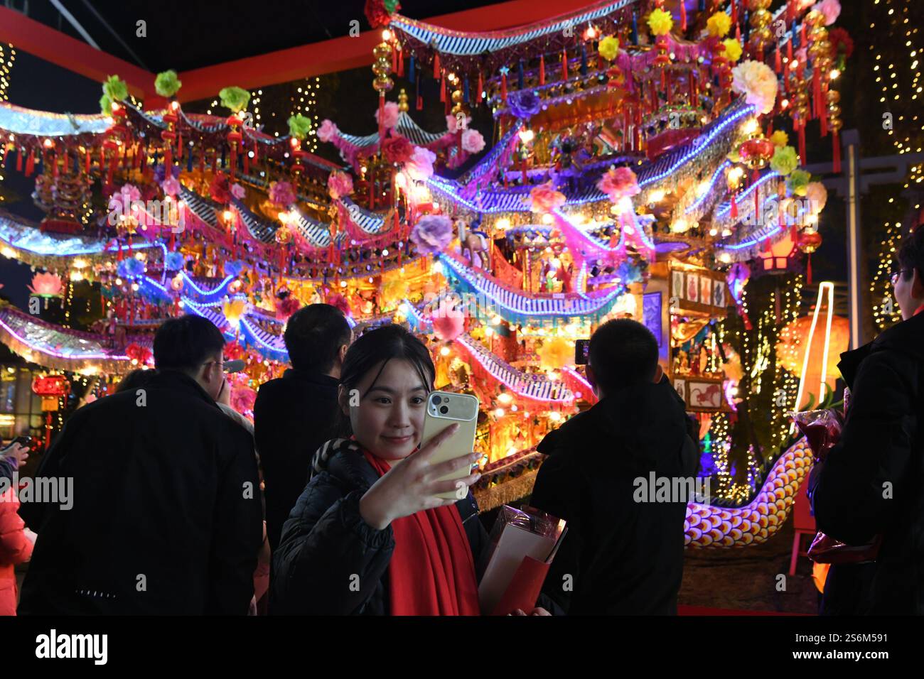 Zigong, China's Sichuan Province. 17th Jan, 2025. Tourists visit the 31st Zigong International ...