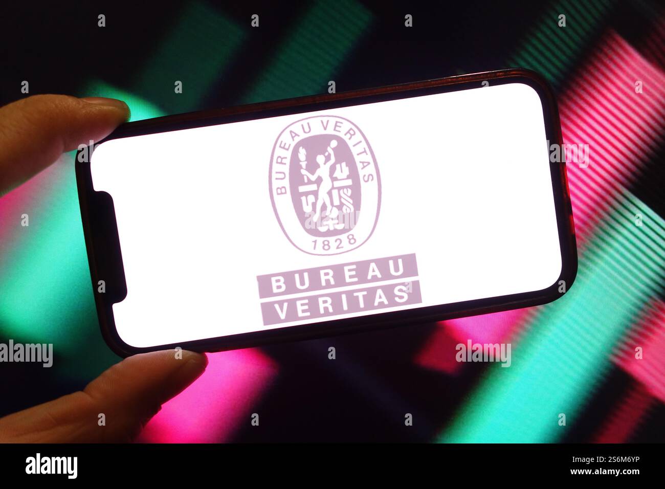 In this photo illustration, the Bureau Veritas company logo is seen ...