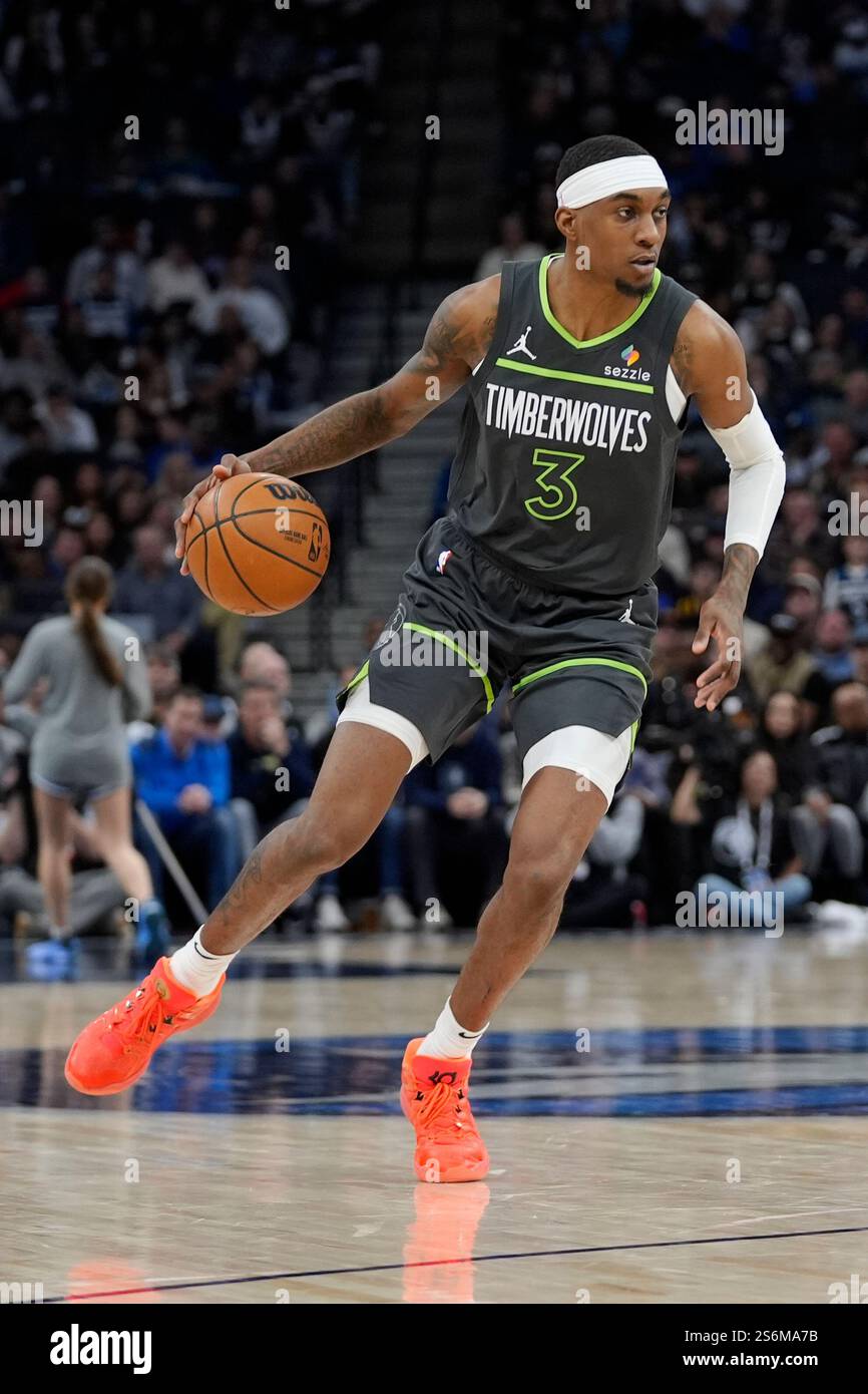 Minnesota Timberwolves forward Jaden McDaniels (3) dribbles down the ...
