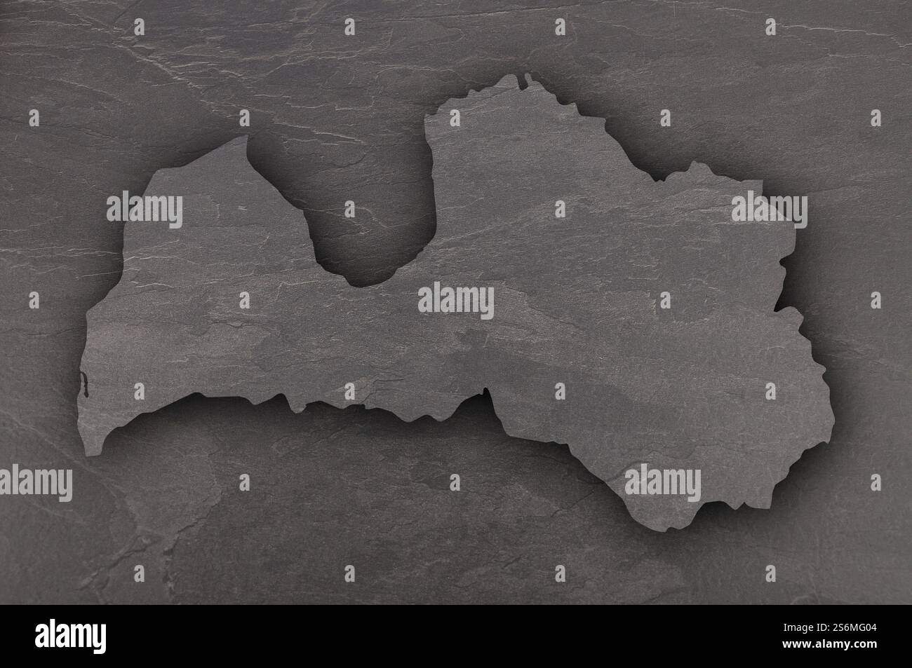 Map of Latvia on dark slate Stock Photo - Alamy