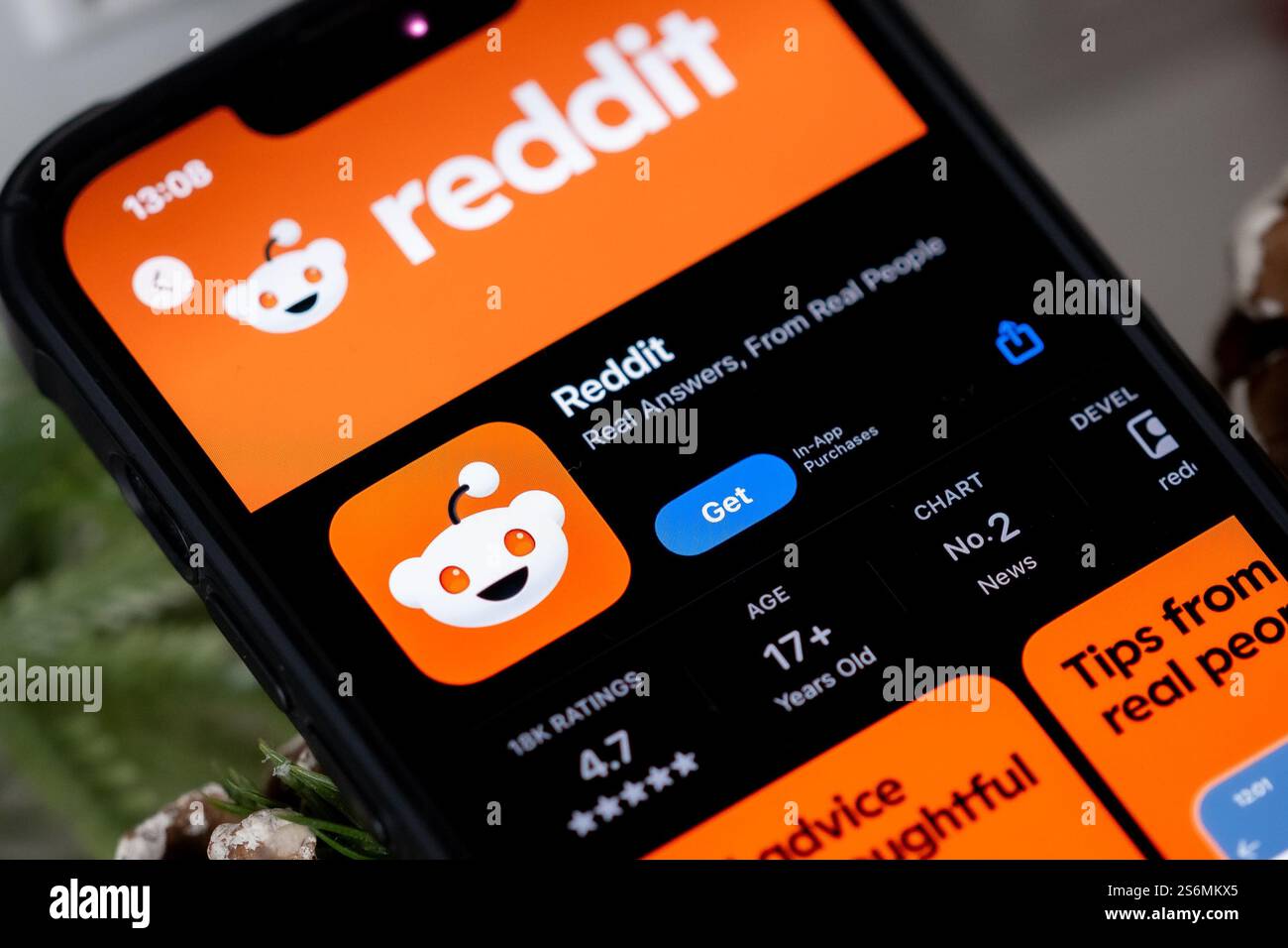 In this photo illustration, the Reddit logo seen displayed on a ...