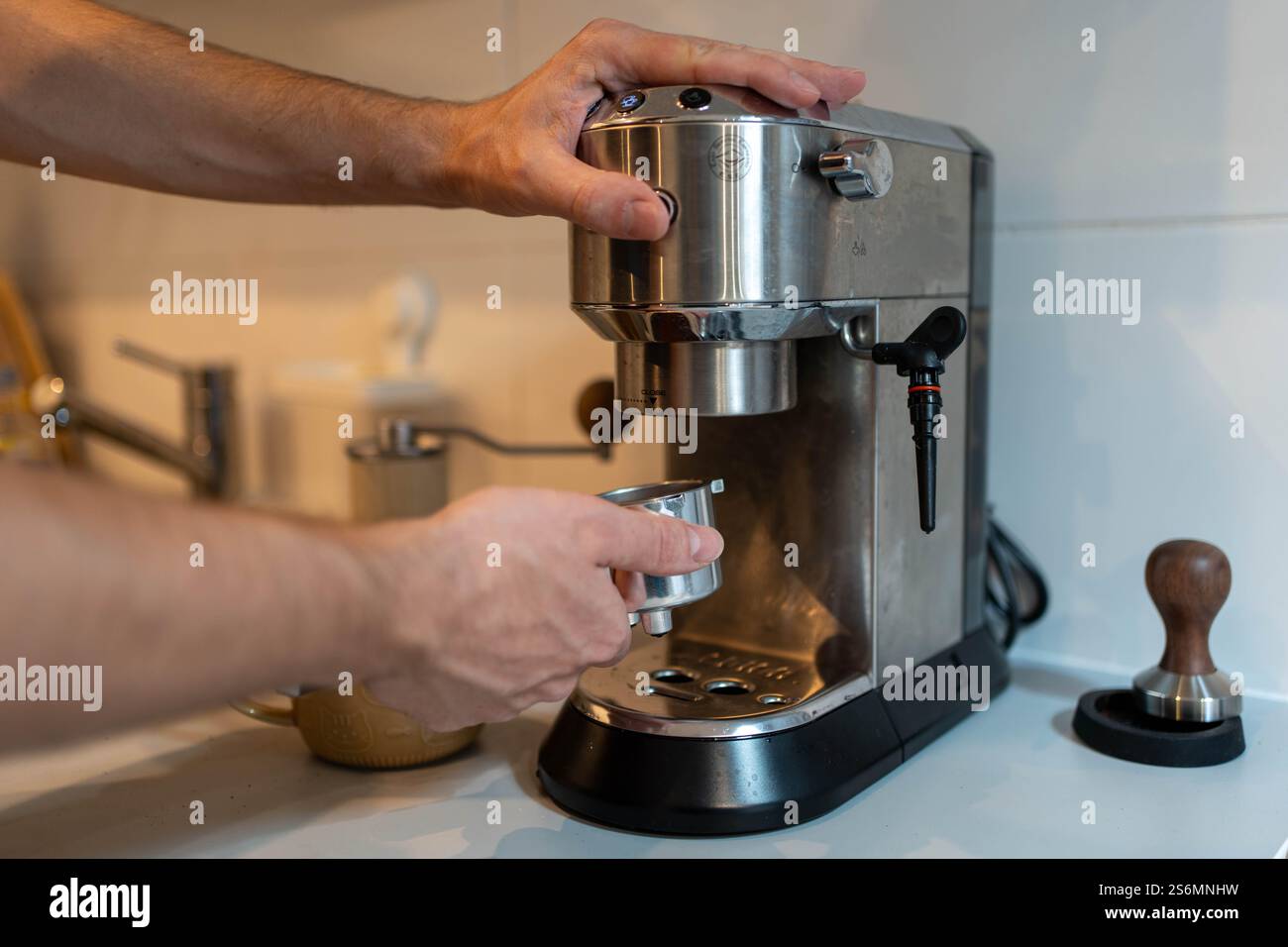 Barista Preparing Espresso with a Modern Coffee Machine Stock Photo - Alamy