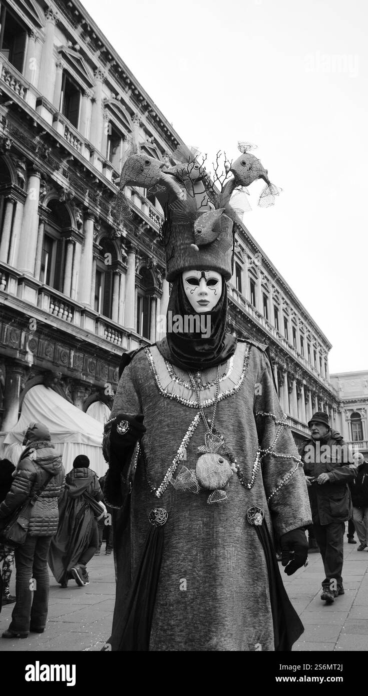 Carnival in Venice. Fish queen mask in costume decorated with tropical ...