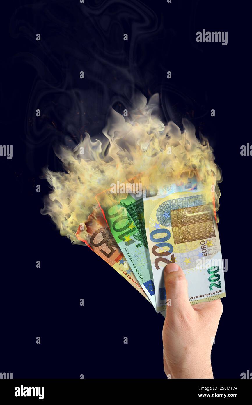 Burning two hundred euro banknotes hi-res stock photography and images ...