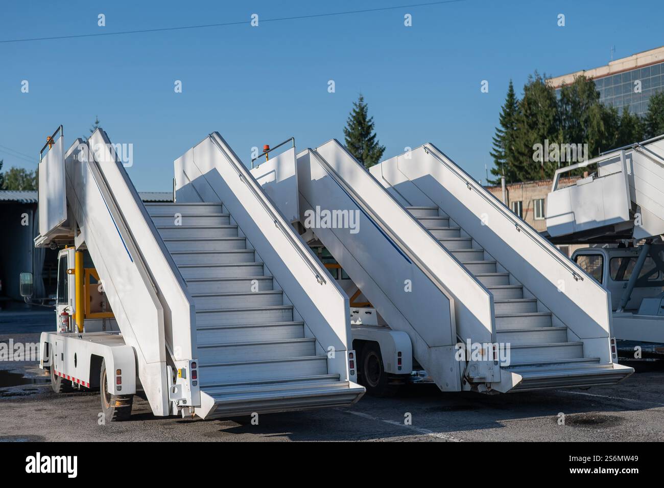 Airplane steps are parked in the airport parking lot Stock Photo - Alamy