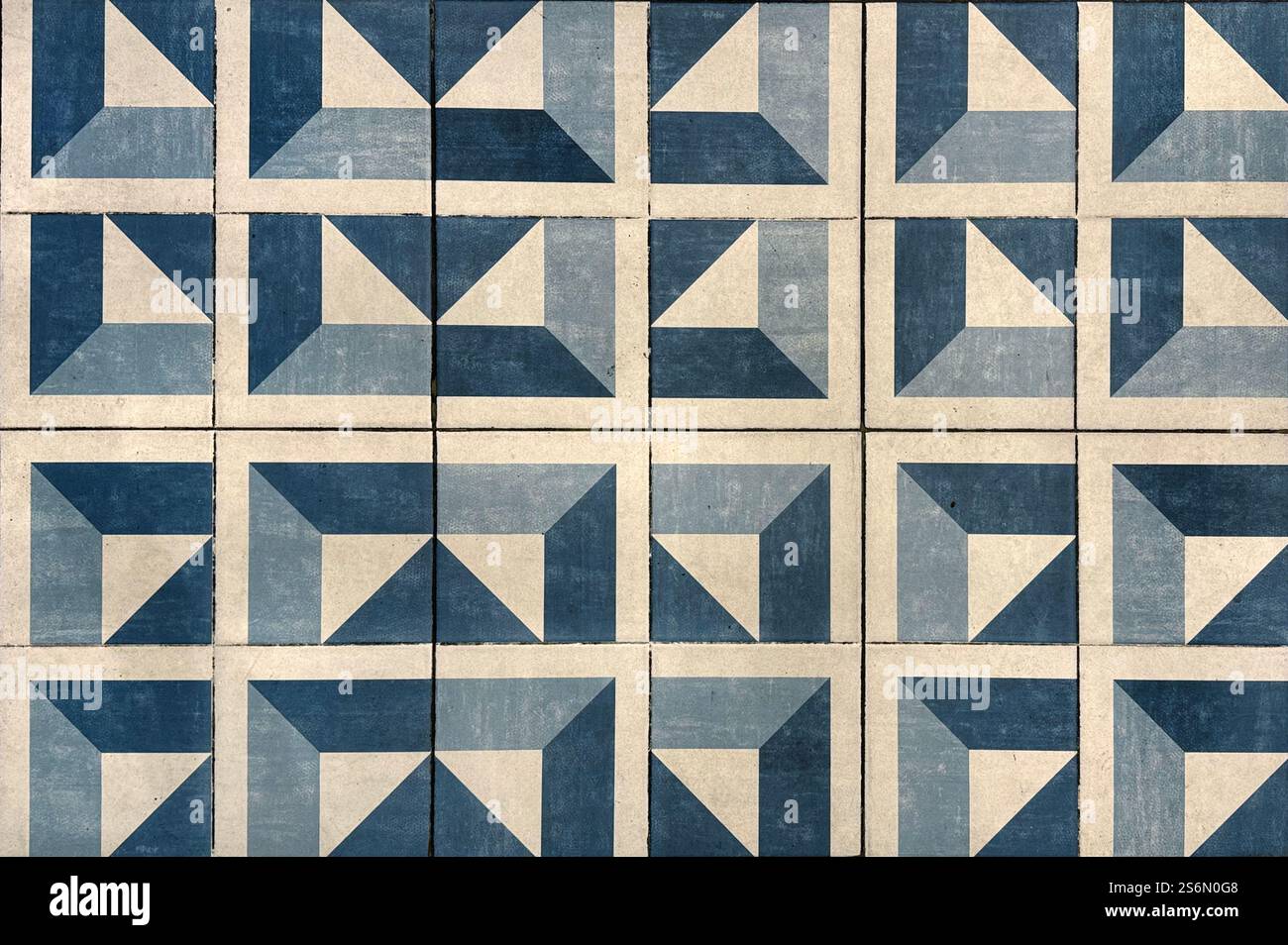 Abstract blue triangular cube geometric pattern painted on floor tiles ...