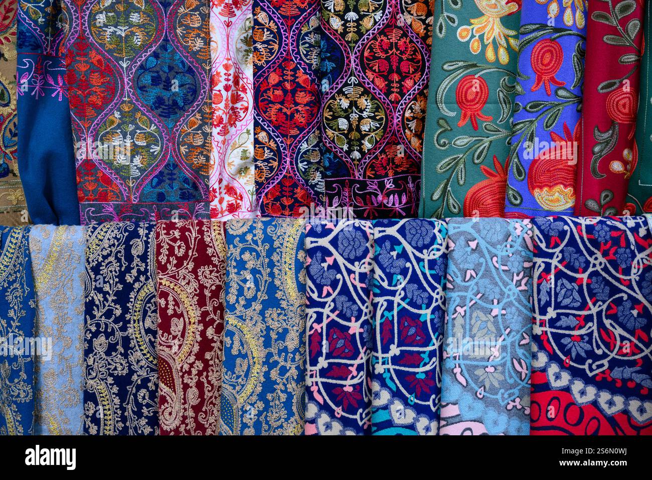 Palette of colors and patterns of national Uzbek fabrics in Samarkand ...