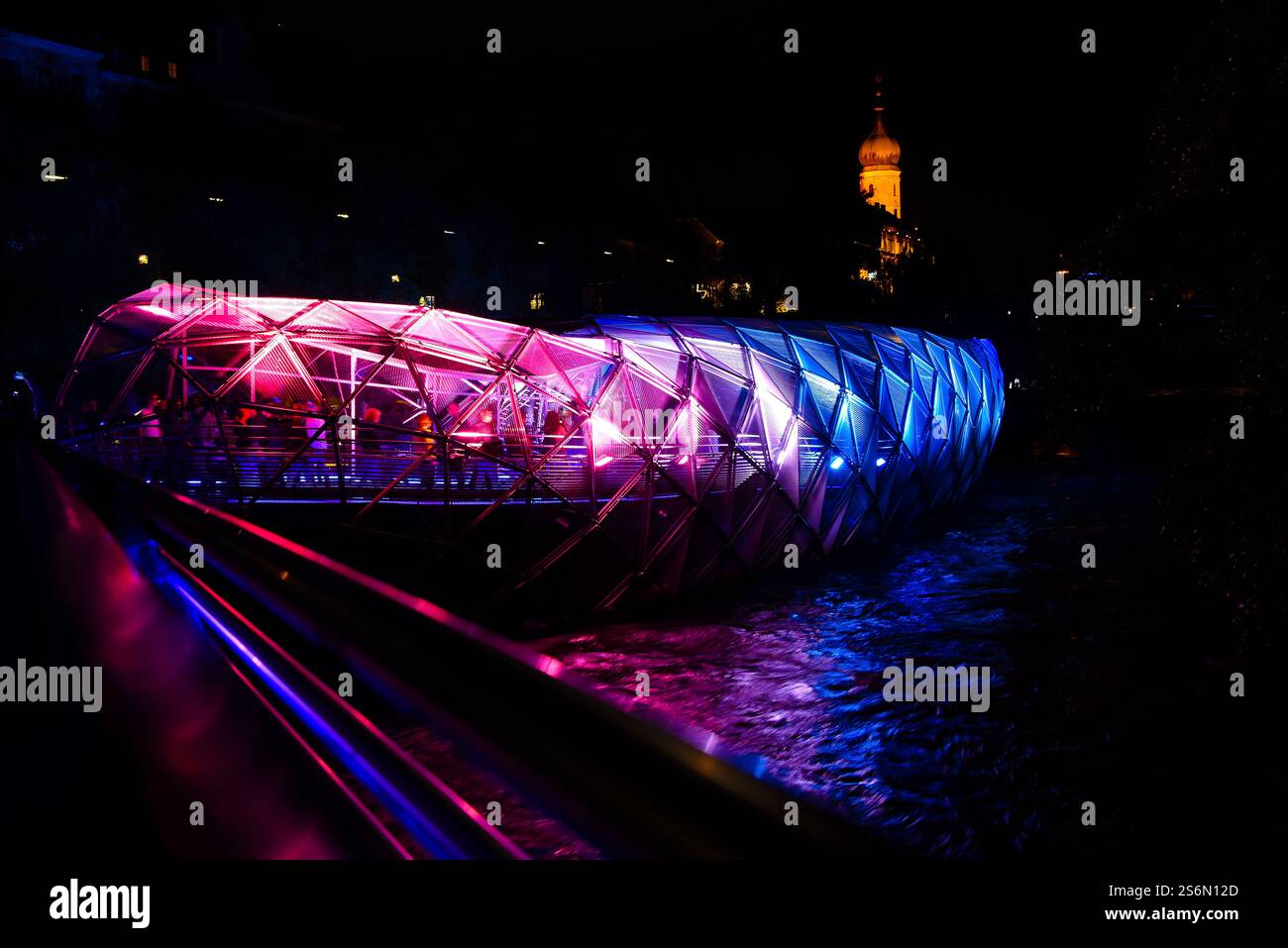 Light art - The illuminated bridge over the Mur in Graz at night Stock ...