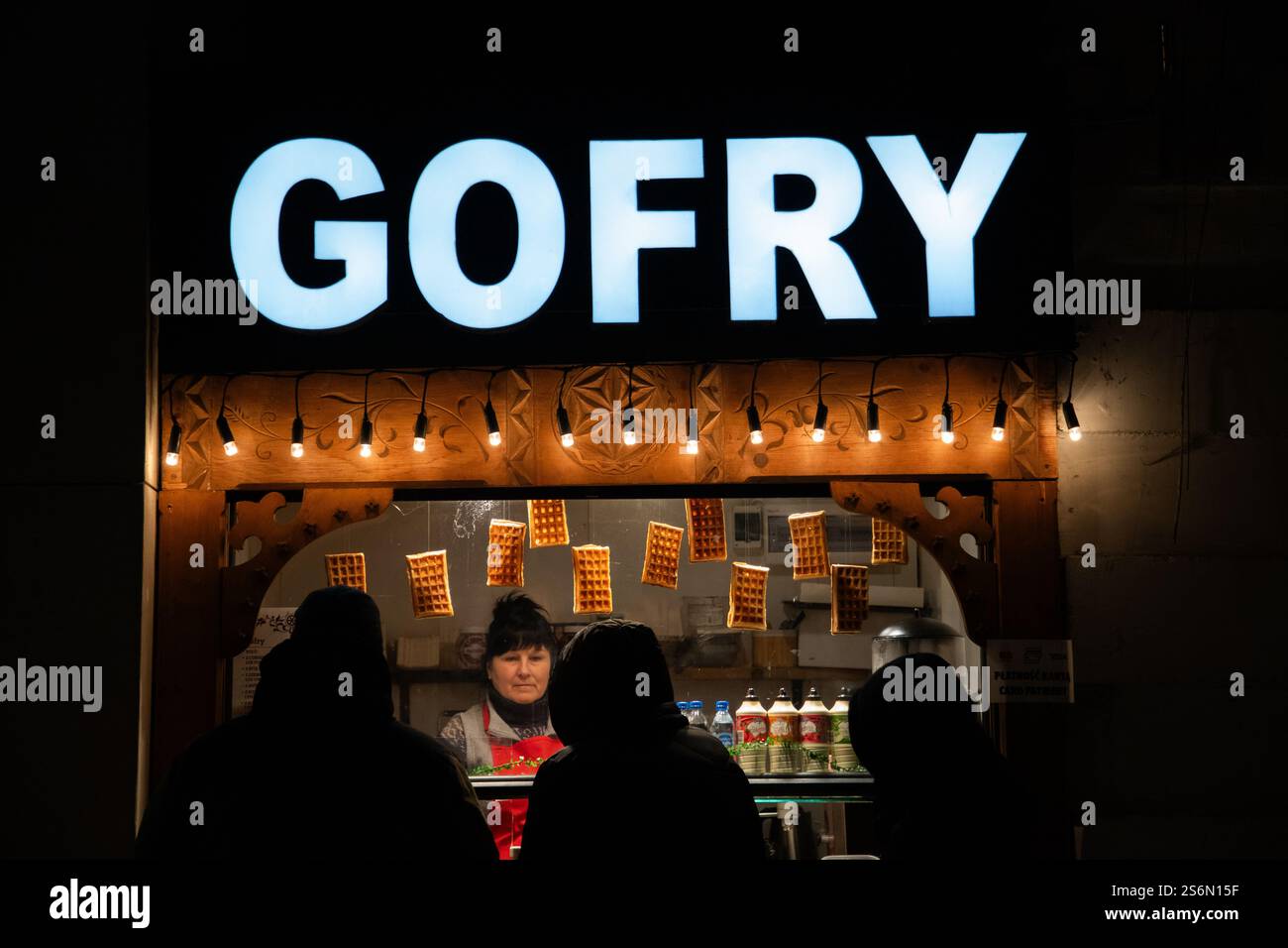 gofry shop sign at night Stock Photo - Alamy