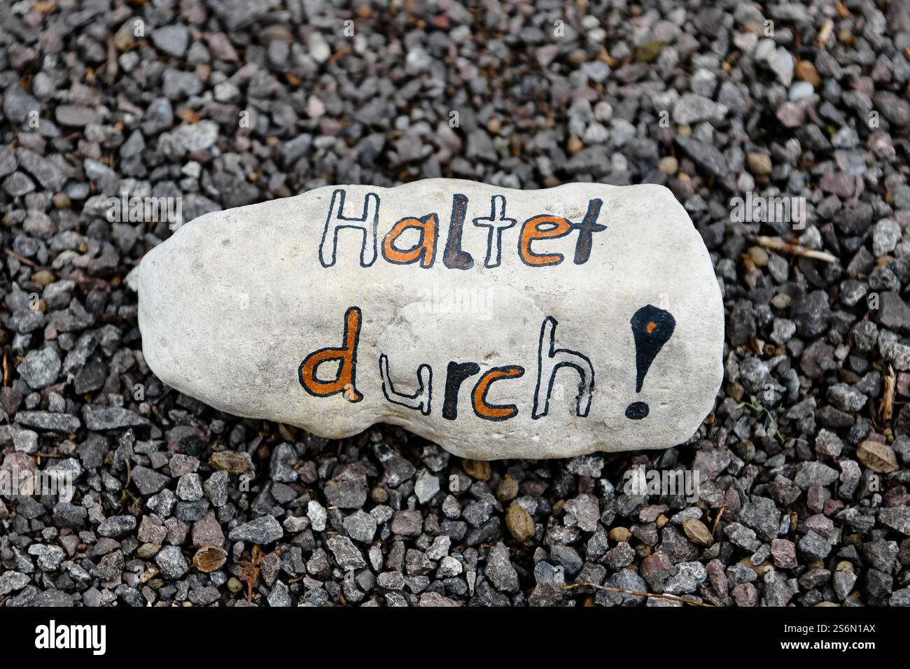 Stone painted by children Stock Photo - Alamy