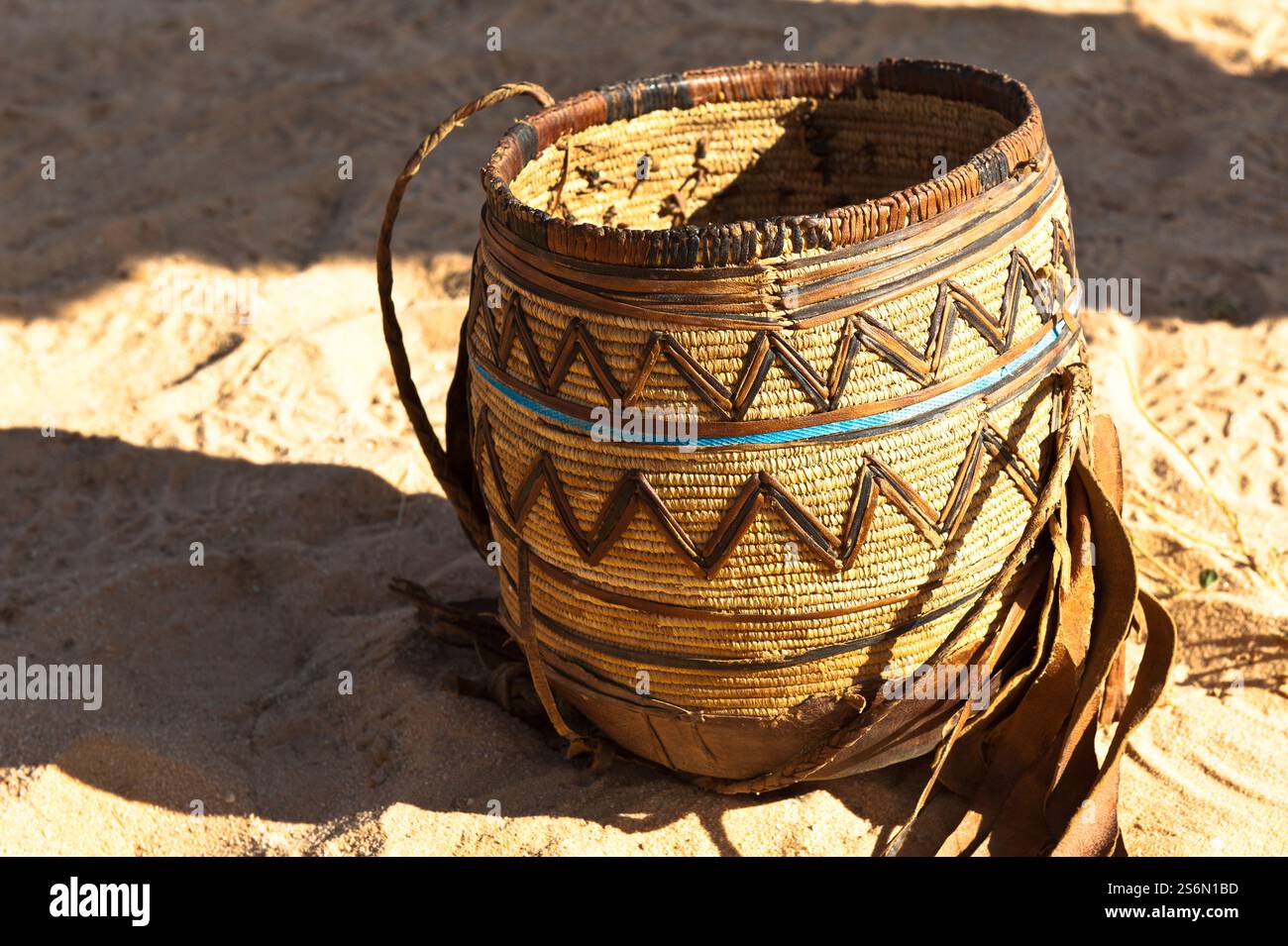 Craftsmanship - Decorated basket made of reeds and camel leather Stock ...