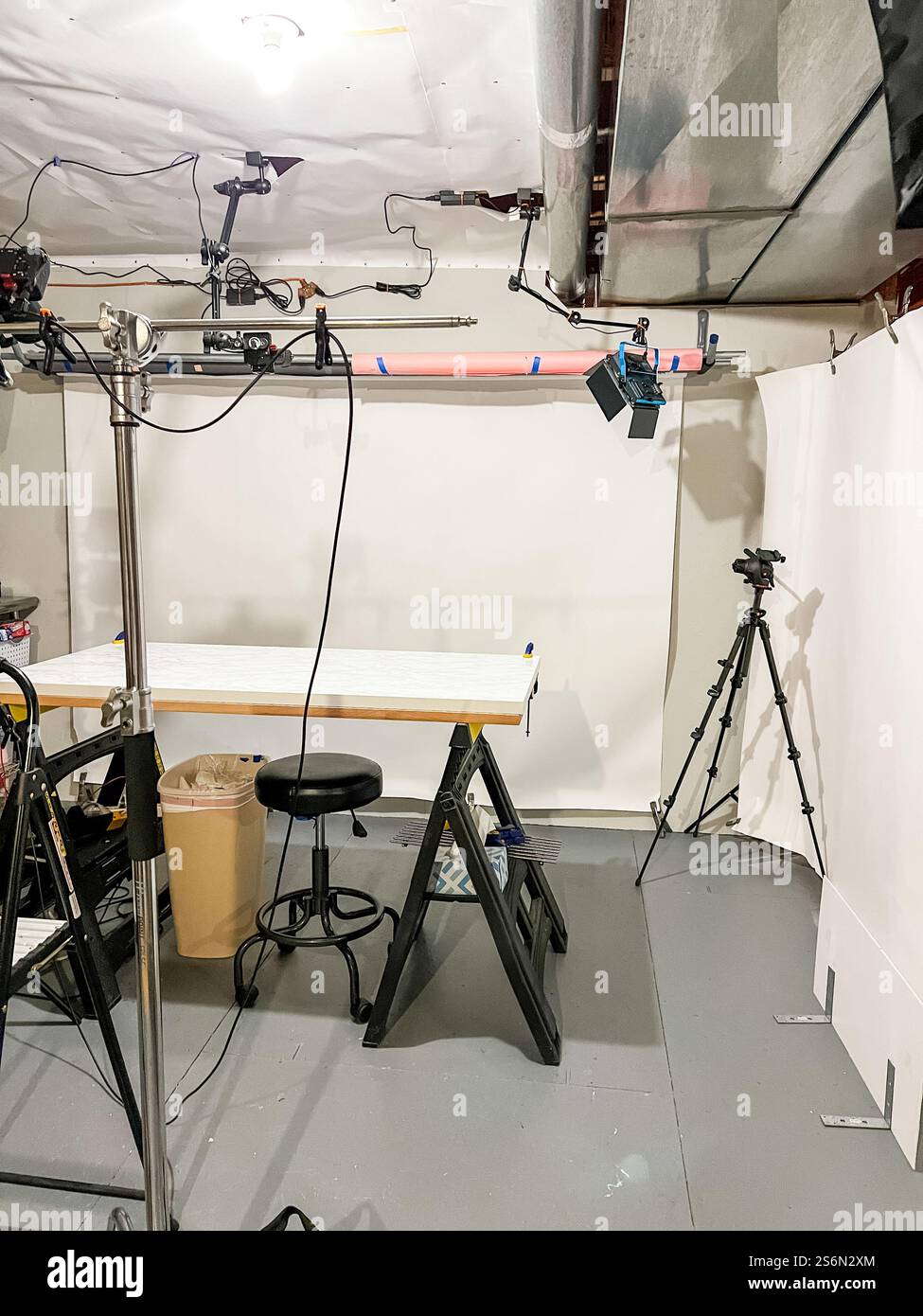 Basement Photography Setup with Lighting Equipment Stock Photo - Alamy