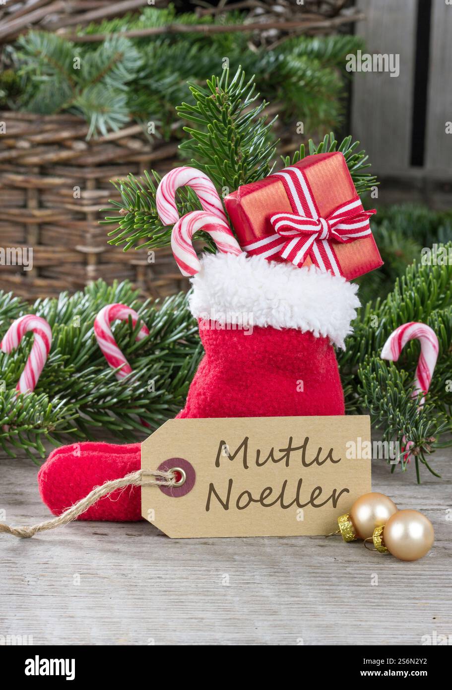 Turkish Christmas card with red Christmas sock with presents and candy ...