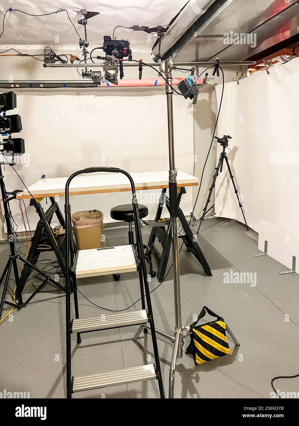 Basement Photography Setup with Lighting Equipment Stock Photo - Alamy