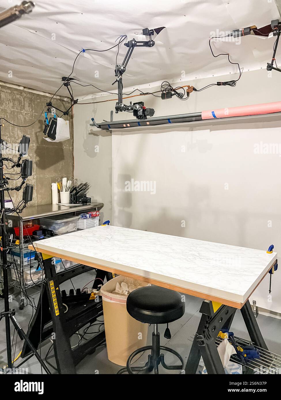 Basement Photography Setup with Lighting Equipment Stock Photo - Alamy
