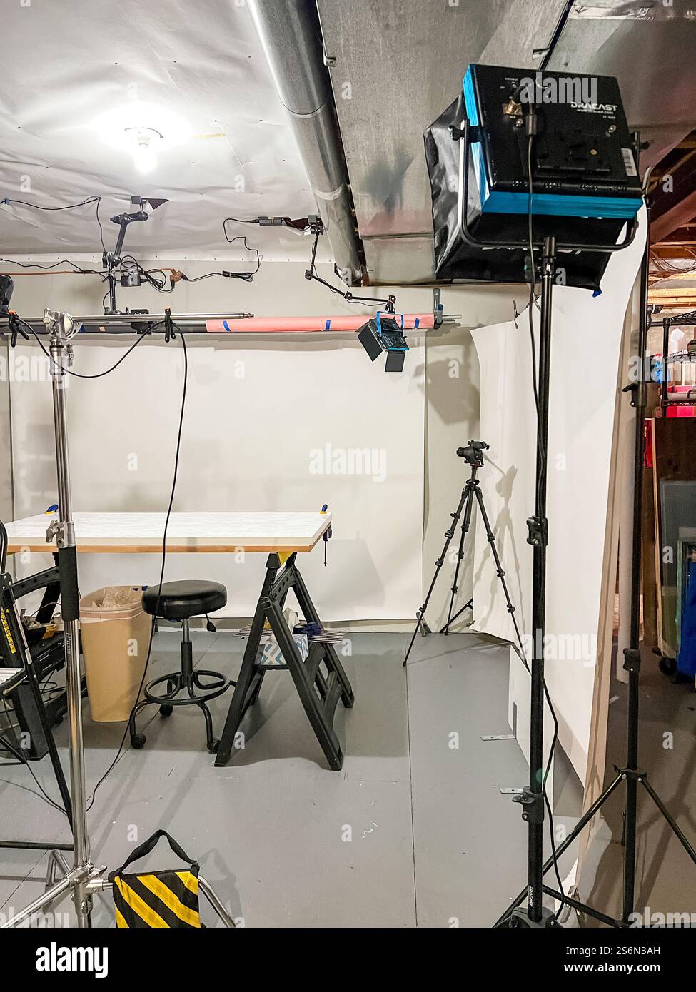 Basement Photography Setup with Lighting Equipment Stock Photo - Alamy