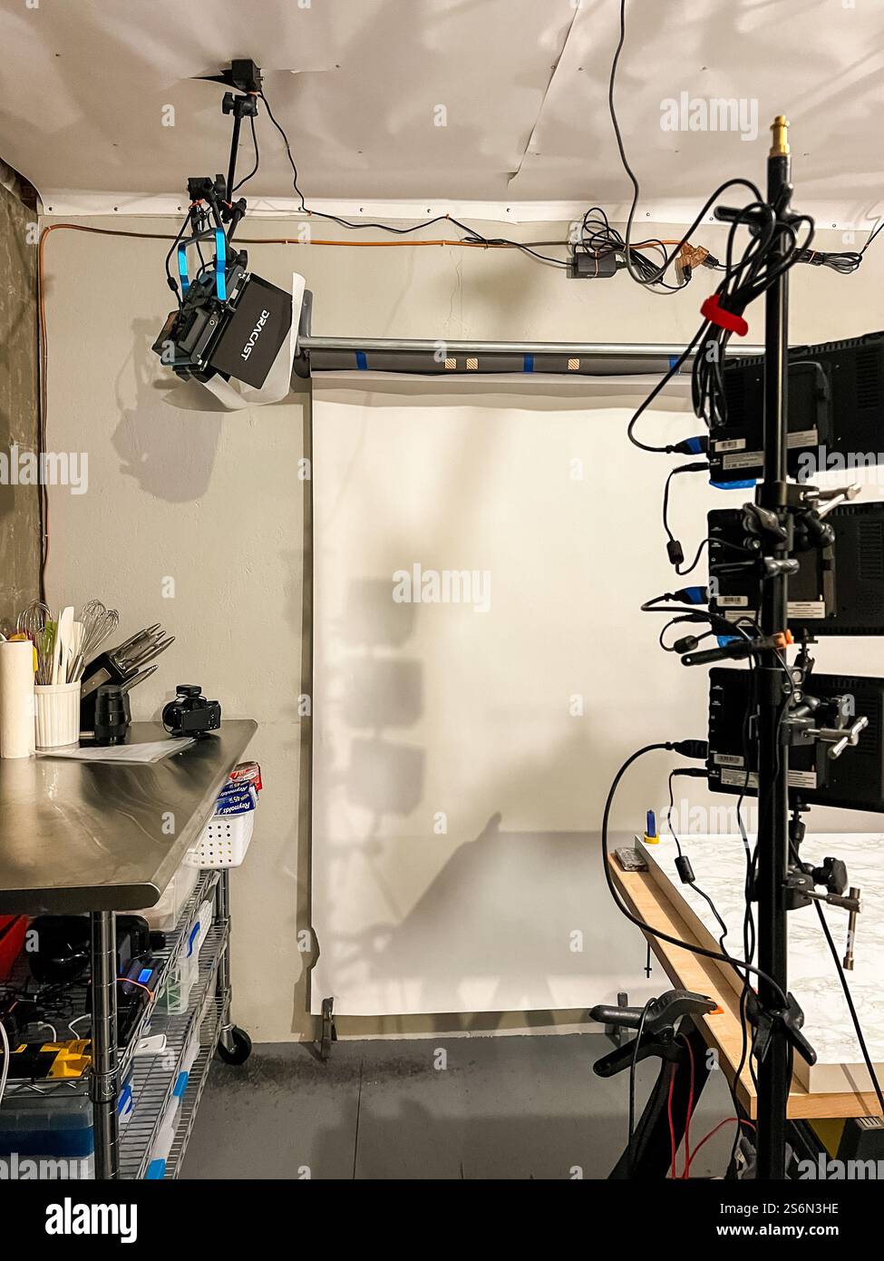 Basement Photography Setup with Lighting Equipment Stock Photo - Alamy