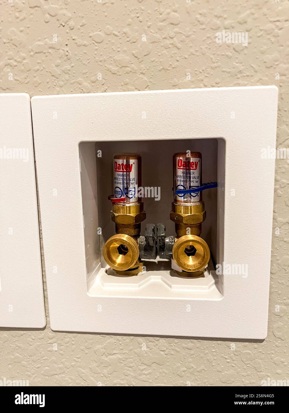 Laundry Room Utility Hookups and Outlet Stock Photo - Alamy