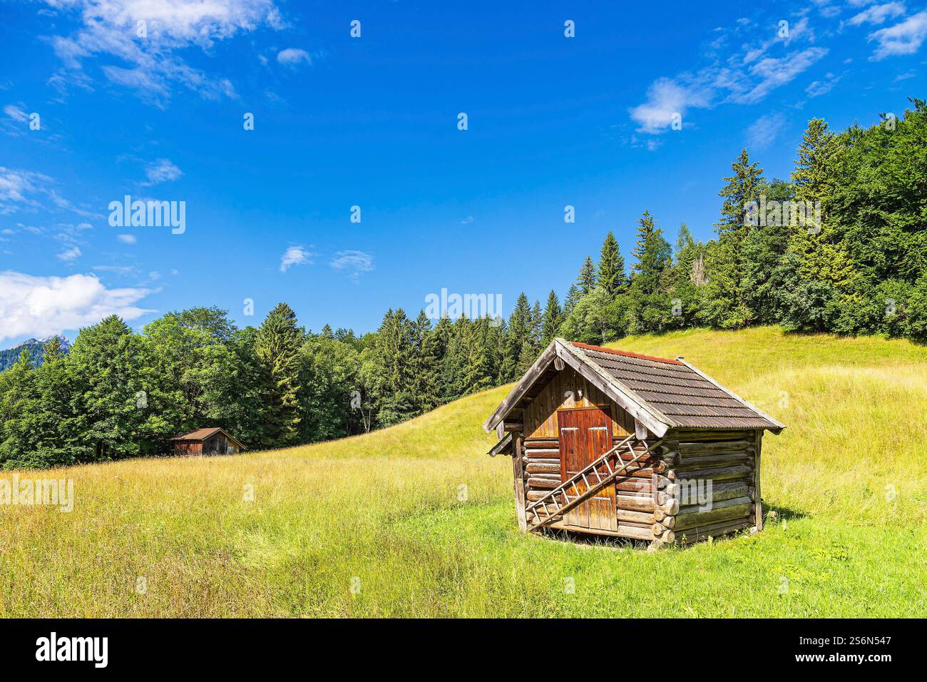 Hay hut in the hummock meadows between Mittenwald and Krün Stock Photo ...
