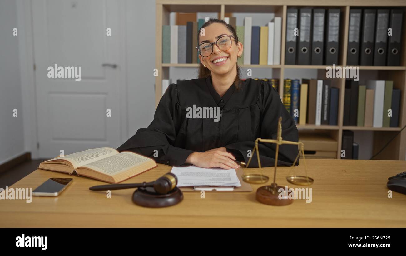 Attractive hispanic female judge in a courtroom office, smiling ...