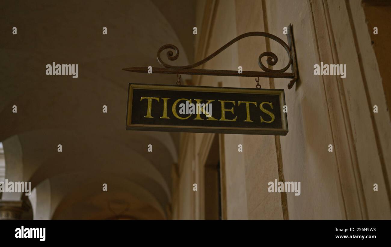 Museum entrance ticket sign hanging in historical building hallway with ...