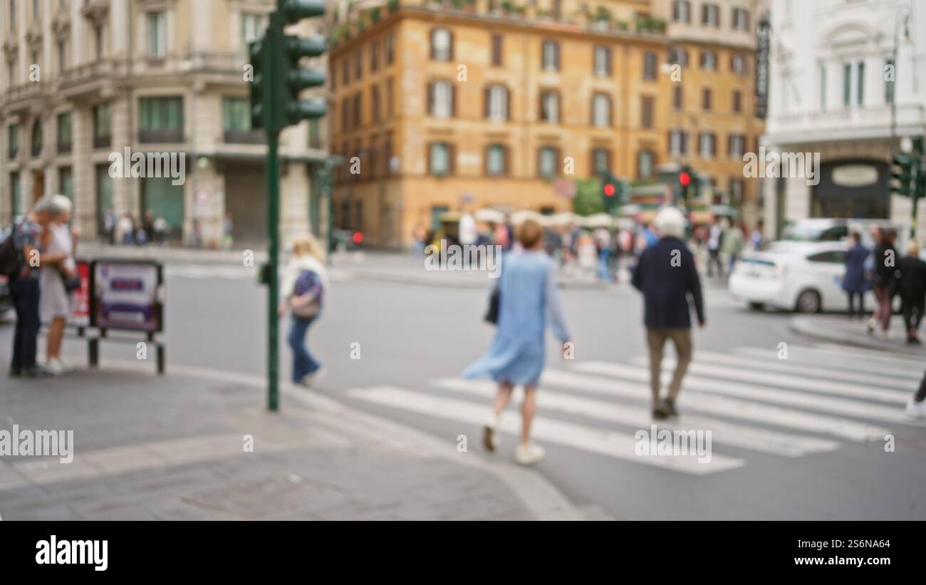 Woman walking across a busy street in rome with buildings blurred in ...