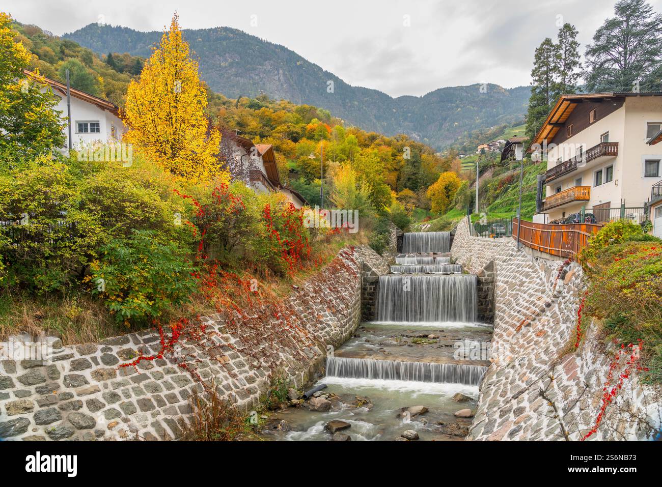 A step waterway with fall foliage color in the trees at Kollman, Colma ...