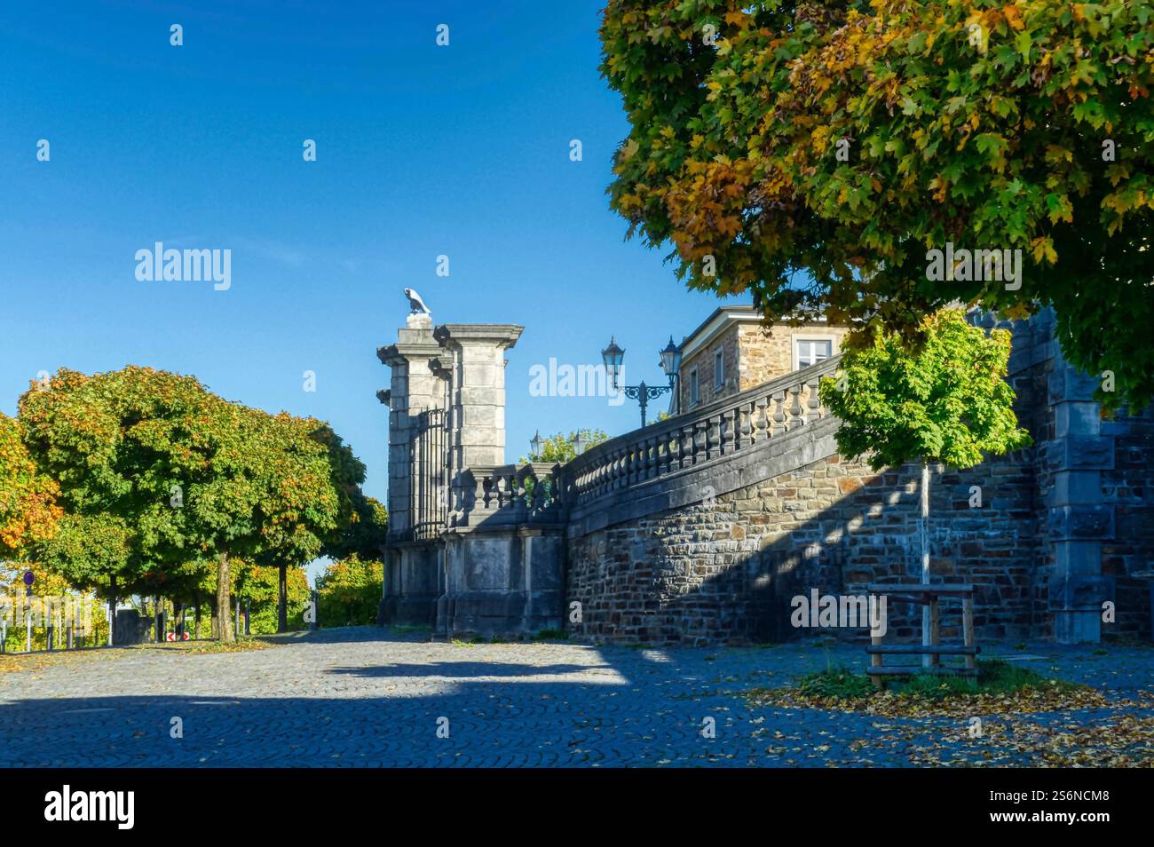 Square and wall in front of a historic castle in Bensberg Stock Photo ...