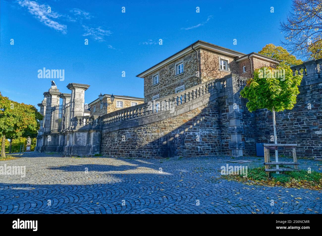 Square and entrance gate of a historic castle in Bensberg Stock Photo ...