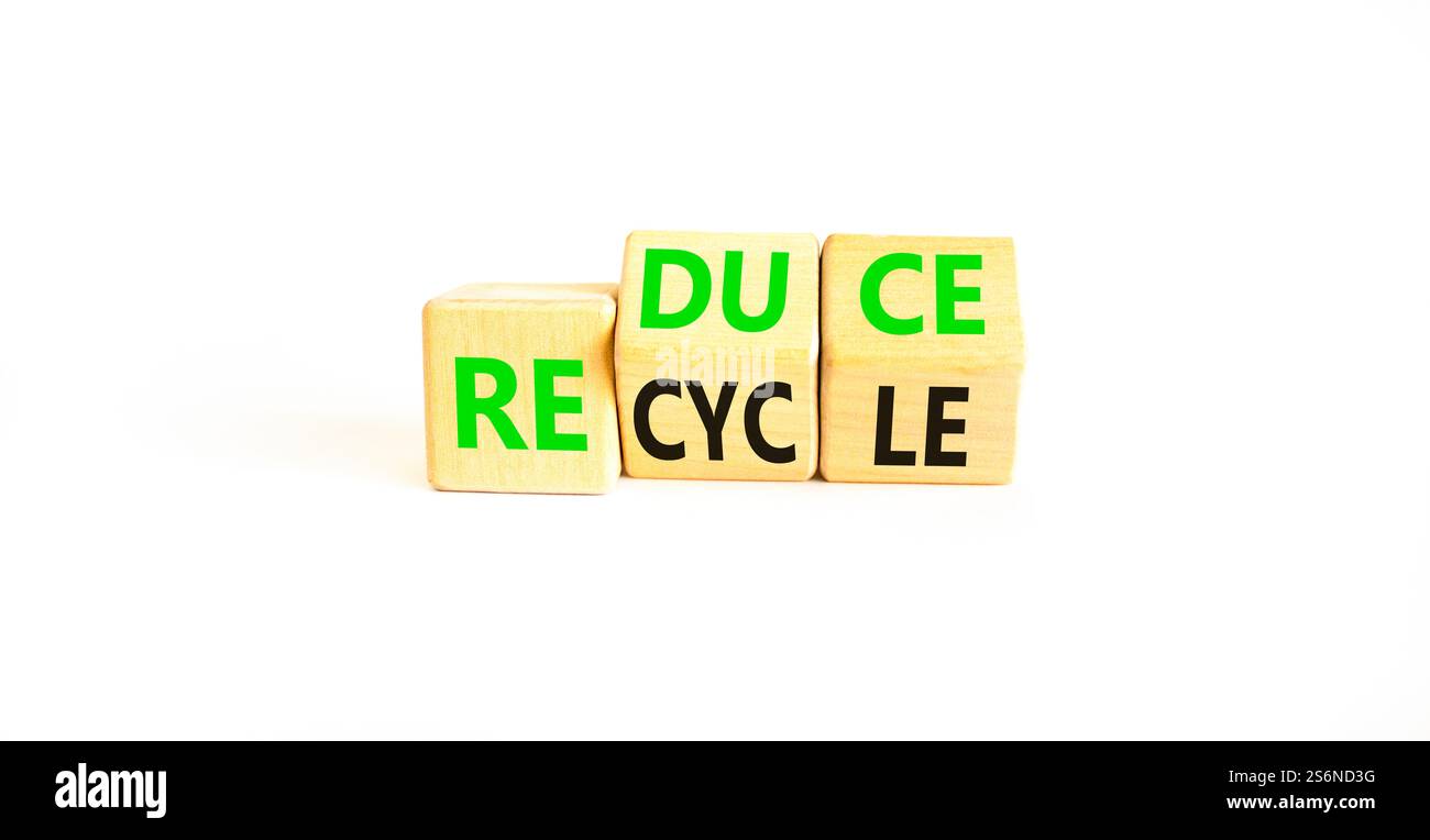 Reduce or recycle symbol. Concept words Reduce Recycle on wooden block ...