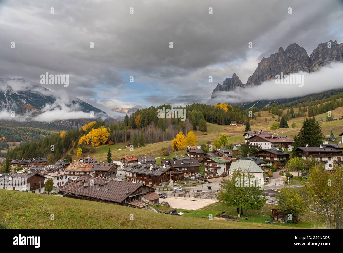 The Dolomite mountain range with fall foliage color Italy, Europe Stock ...